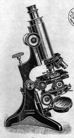 A black and white photo of a machine objectDescription automatically ...