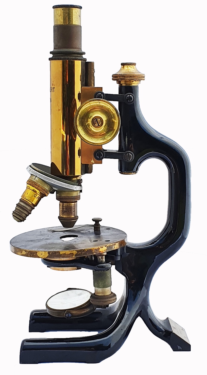 A picture containing table, sitting, small, oldDescription ...