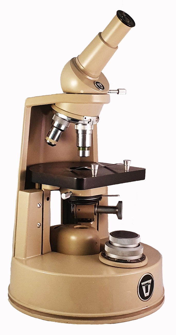 A picture containing indoor, object, microscope, tableDescription ...