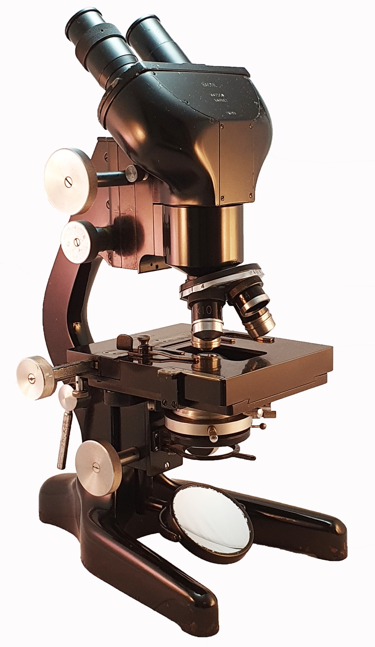 A close-up of a microscopeDescription automatically generated with ...