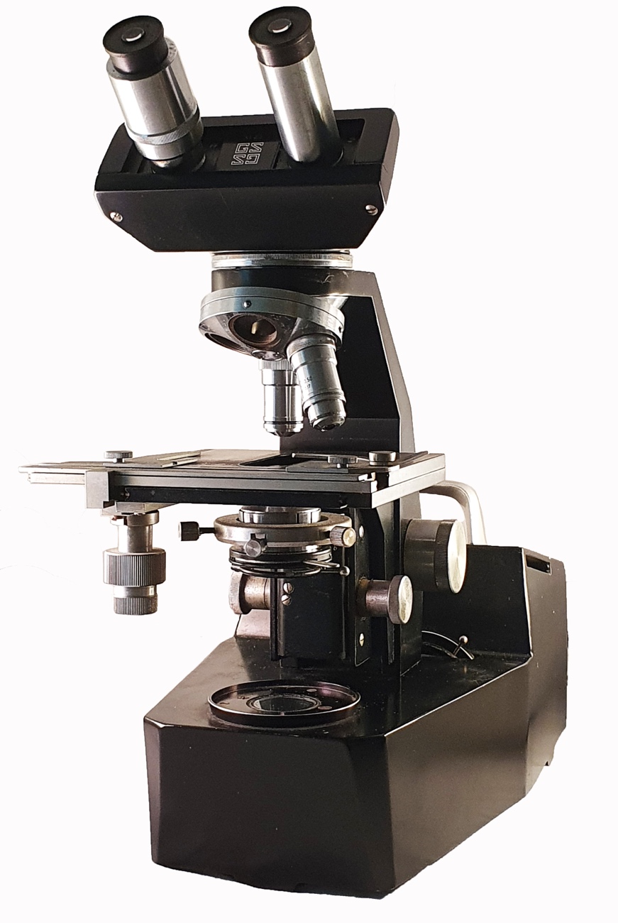 A picture containing microscope, indoorDescription automatically generated