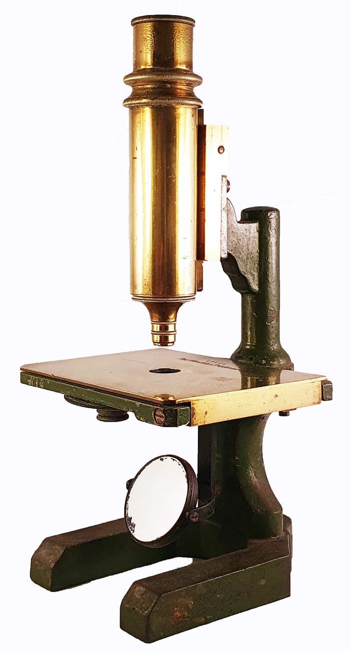 A close-up of a microscopeDescription automatically generated with low ...