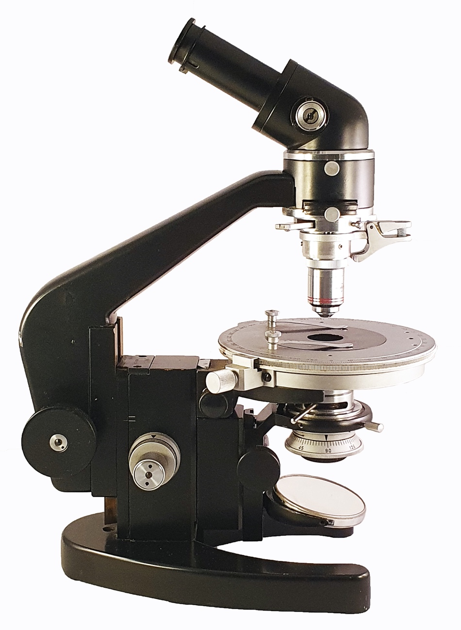 A close-up of a microscopeDescription automatically generated with ...