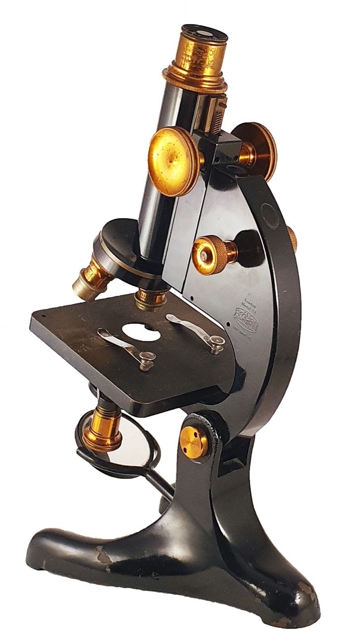 A picture containing indoor, table, black, sittingDescription ...