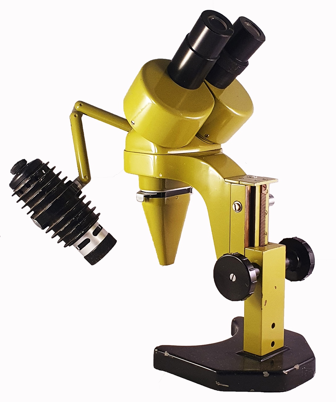 A yellow microscope with black lensesDescription automatically ...